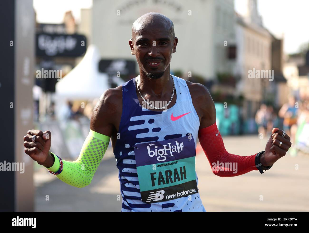 Sir Mo Farah crosses the finish line to place fourth in the Men's Elite ...