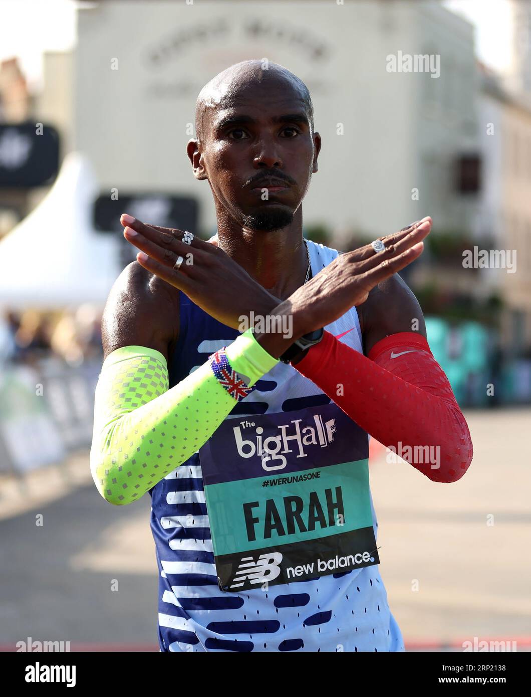 Sir Mo Farah crosses the finish line to place fourth in the Men's Elite ...