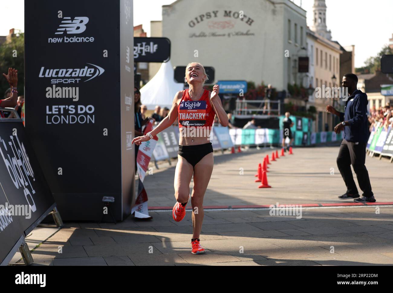 Calli Thackery crosses the finish line to win the Women's Elite race of ...