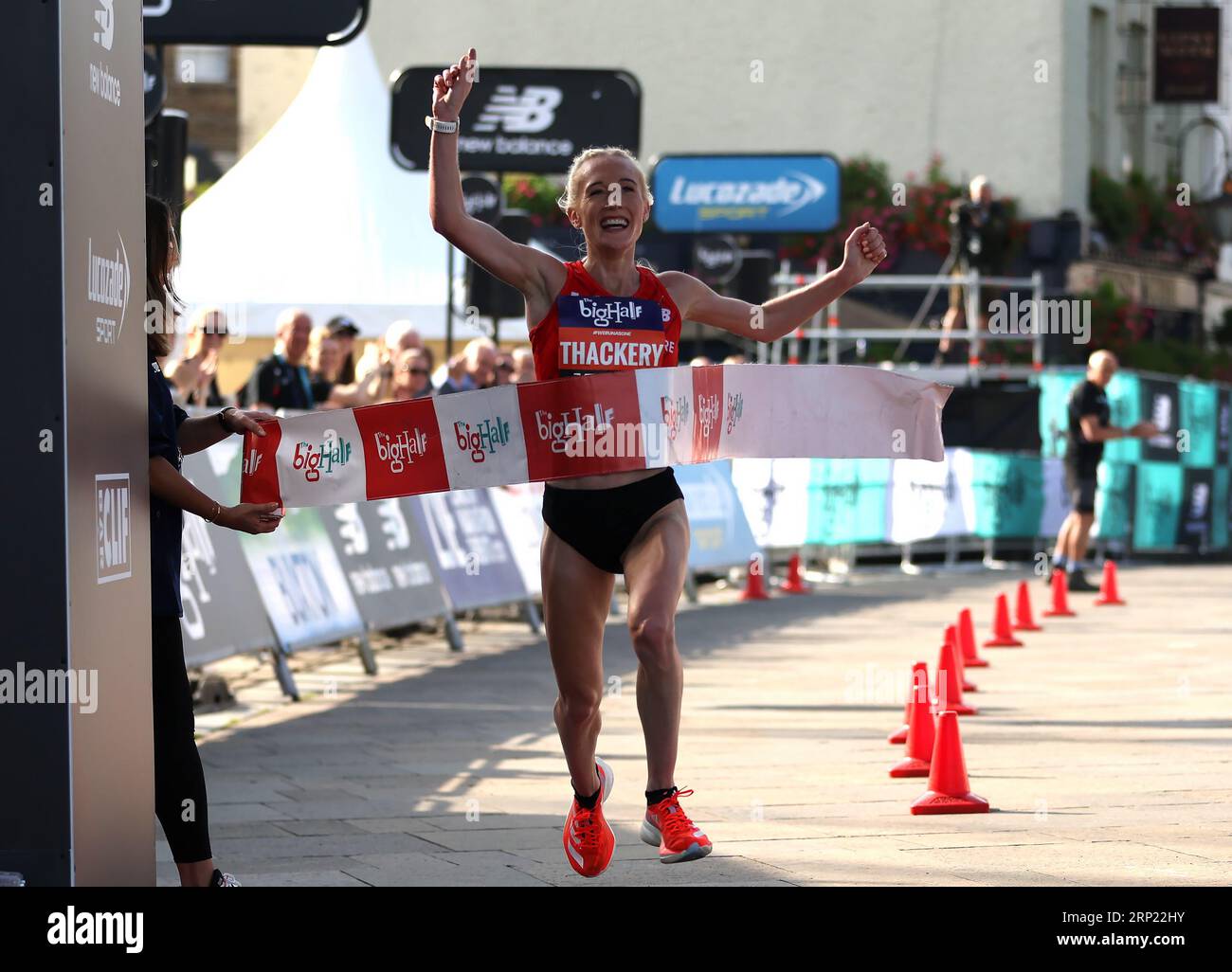 Calli Thackery crosses the finish line to win the Women's Elite race of ...