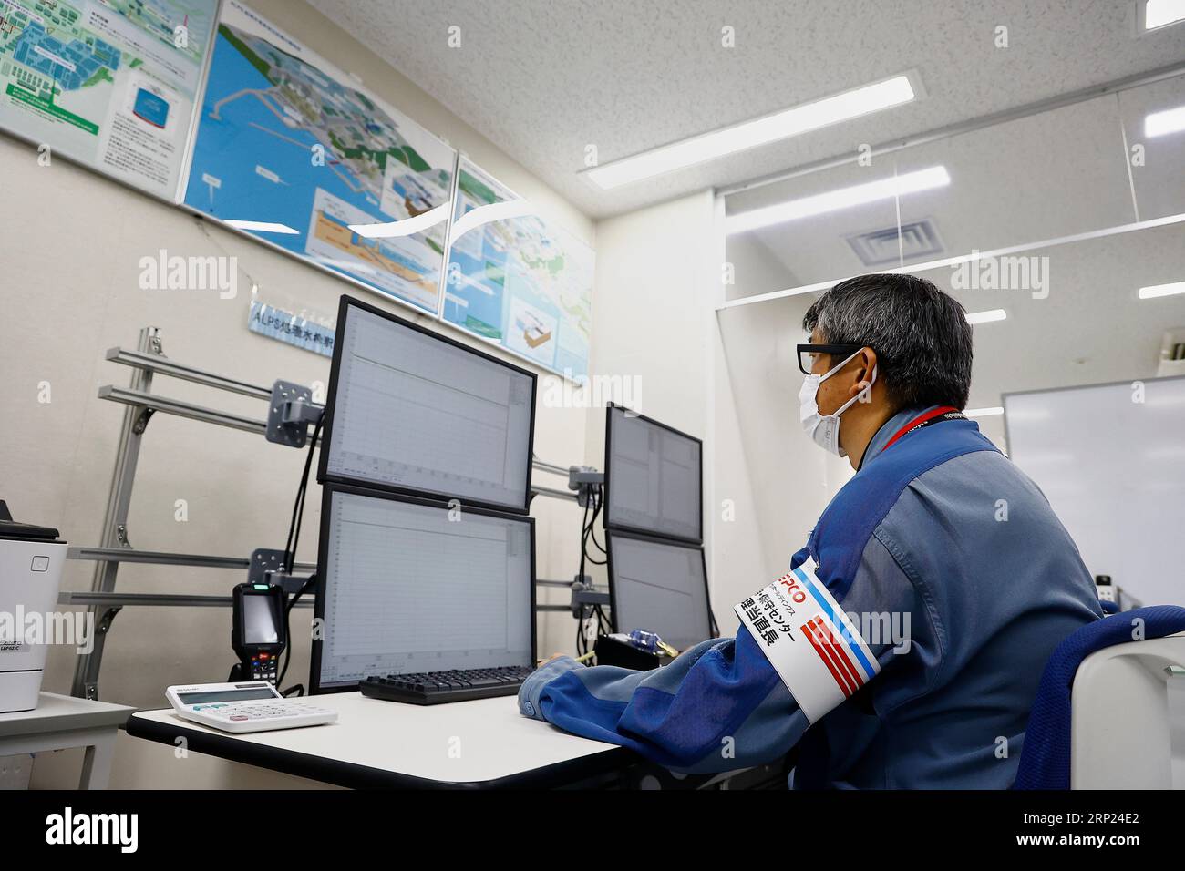 Futaba, Japan. 3rd Sep, 2023. A staff member of TEPCO monitors from the ...