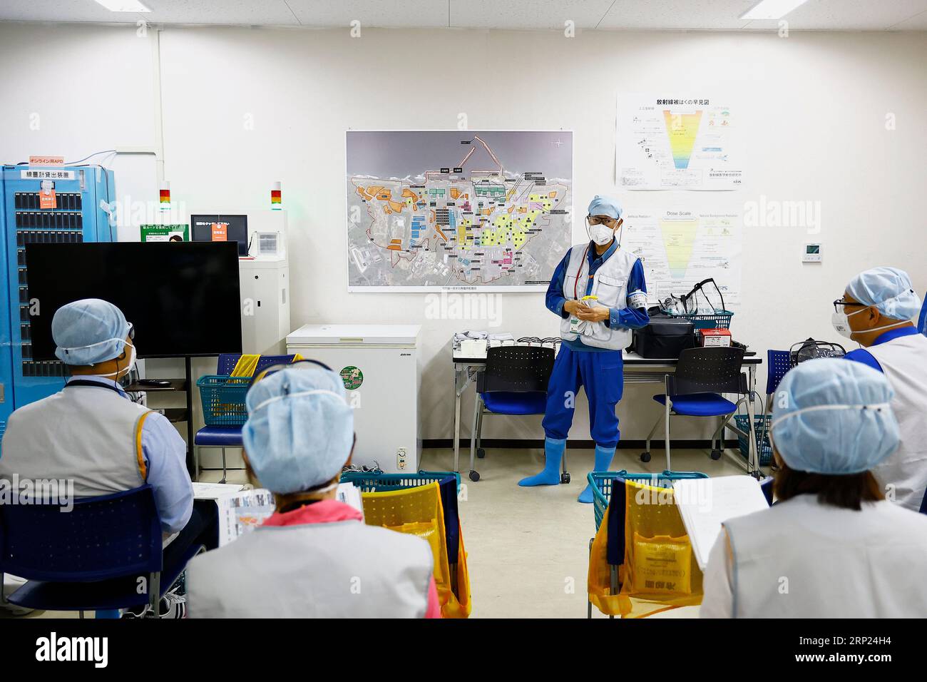 Futaba, Japan. 3rd Sep, 2023. TEPCO official Matsuo Keisuke explains to ...