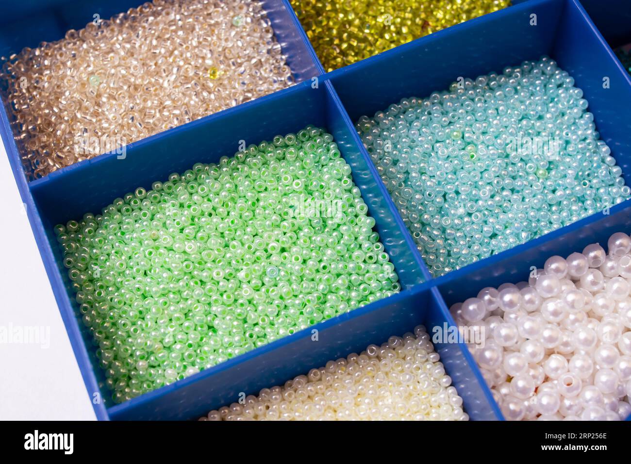 Colorful beads in containers close up, handicrafts, macrophoto Stock ...