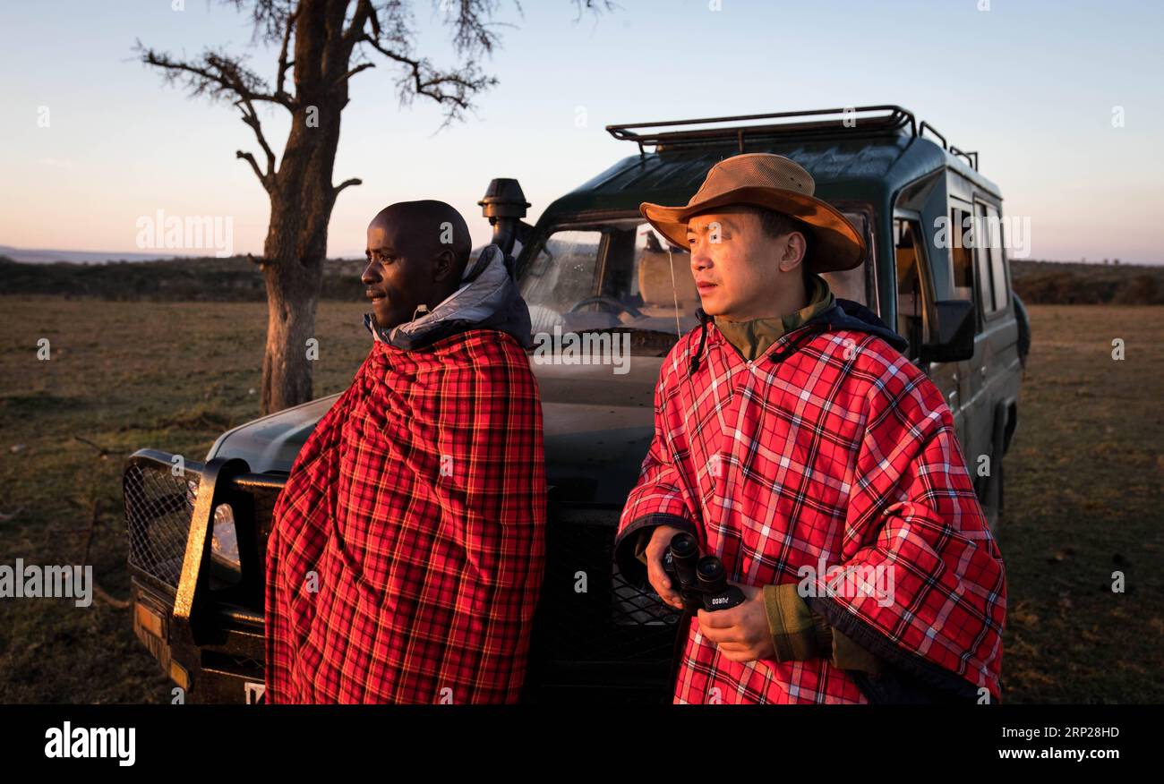 MAASAI MARA -- Chinese wildlife conservationist Zhuo Qiang and a local ...