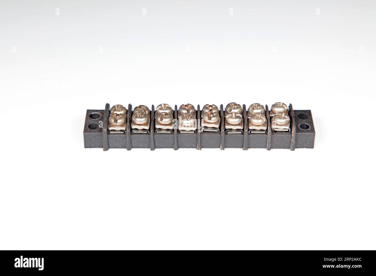 Metal screw fasteners on white background Stock Photo - Alamy