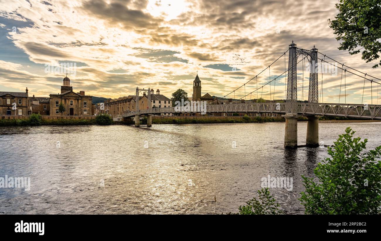 Suspended walkway that passes over the River Ness in the beautiful city ...