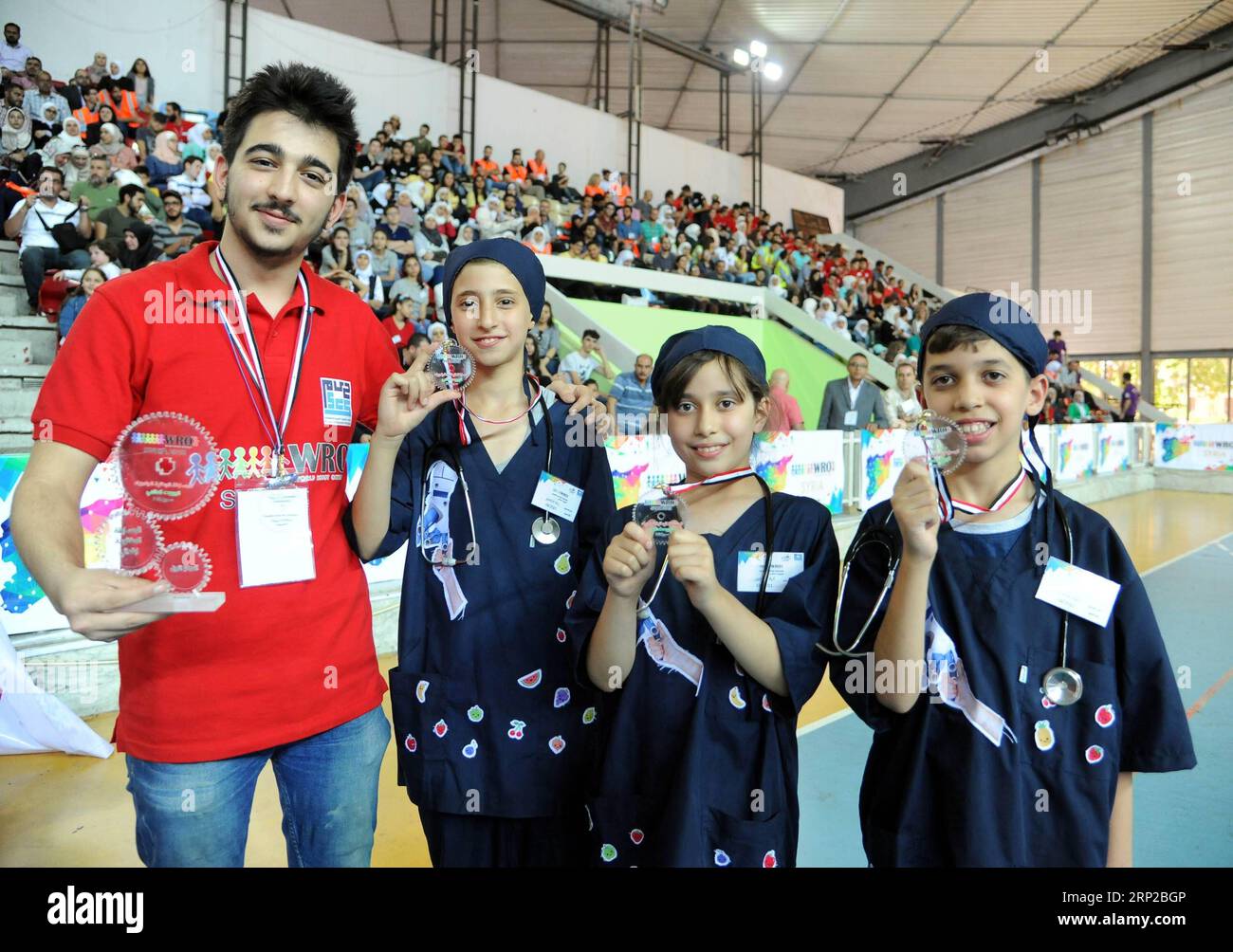 (180829) -- DAMASCUS, Aug. 29, 2018 -- Winners of the Syrian national ...