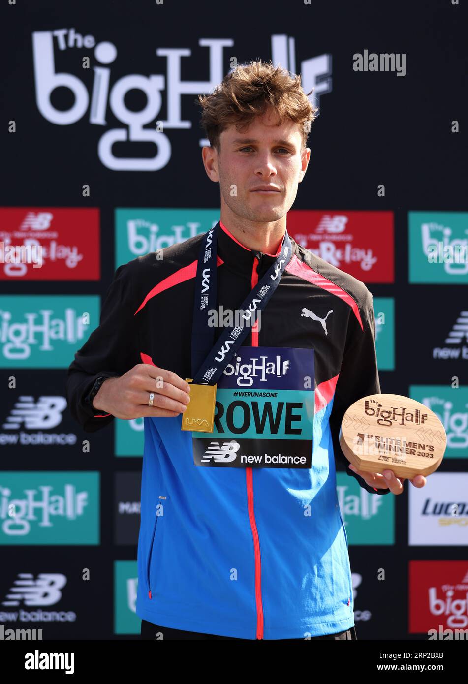 Jack Rowe with his trophy and medal for the Men's Elite race following ...