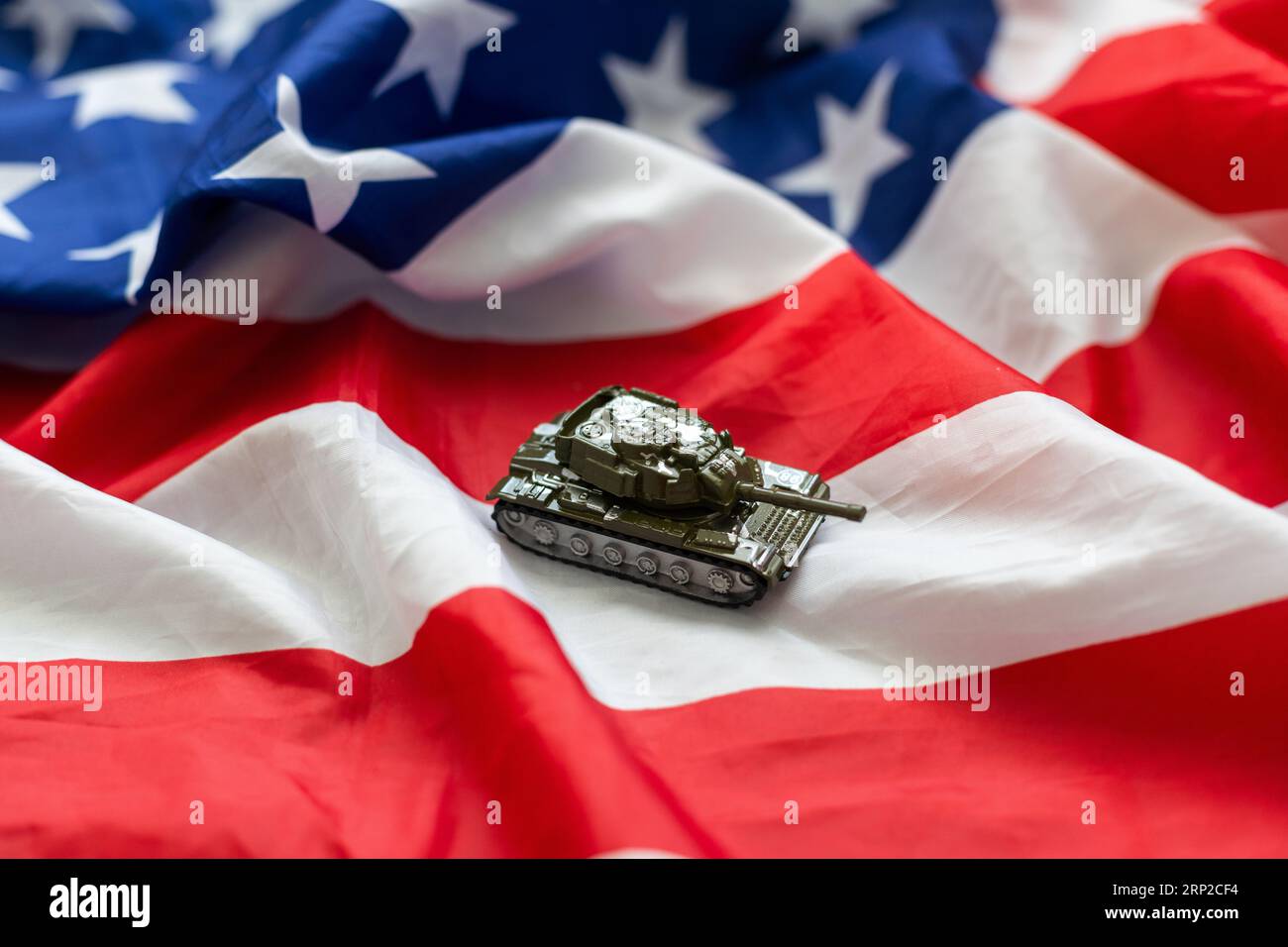 Toy model tank on USA national flag Stock Photo - Alamy