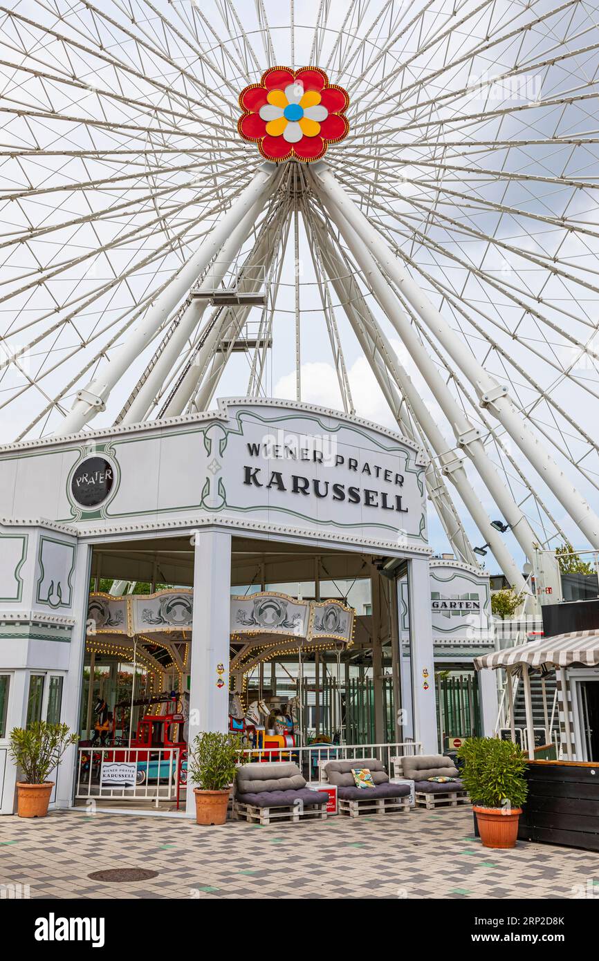 The Vienna Carousel, behind it the Flower Wheel, Prater, Vienna ...