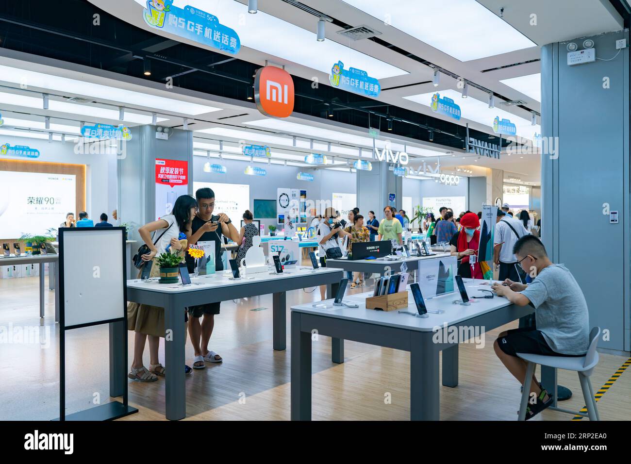CHONGQING, CHINA - SEPTEMBER 3, 2023 - Citizens and children shop for ...