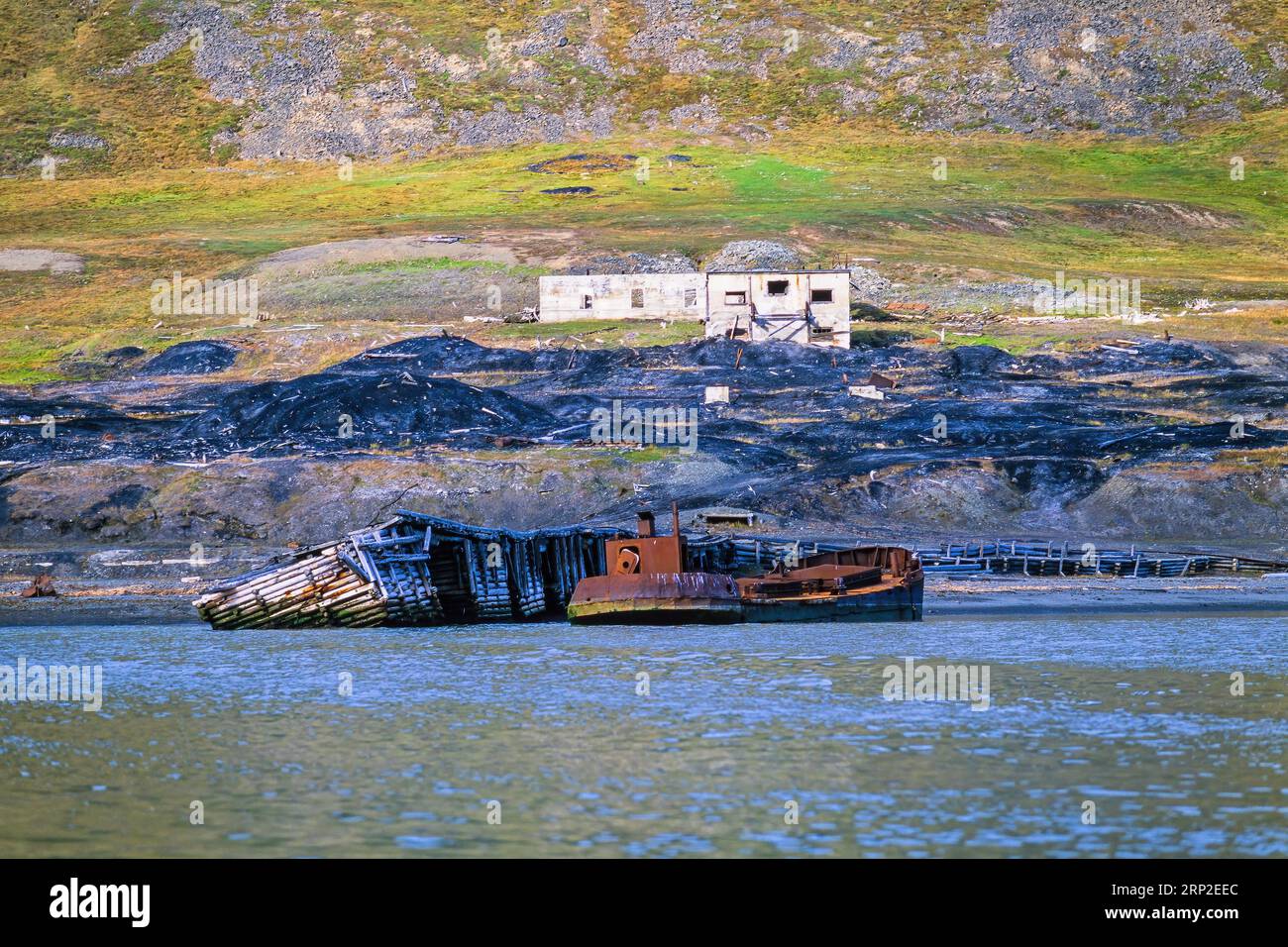 Shipwreck at a pier at an old coal port, Svalbard Stock Photo - Alamy