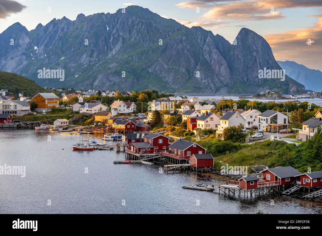 Village view of the fishing village Reine, Traditional red Rorbuer ...