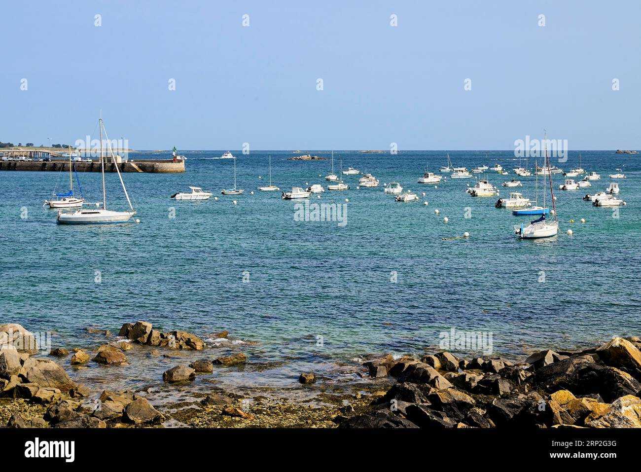 Rocky coast at the old port of Roscoff, Finistere, Brittany, France ...
