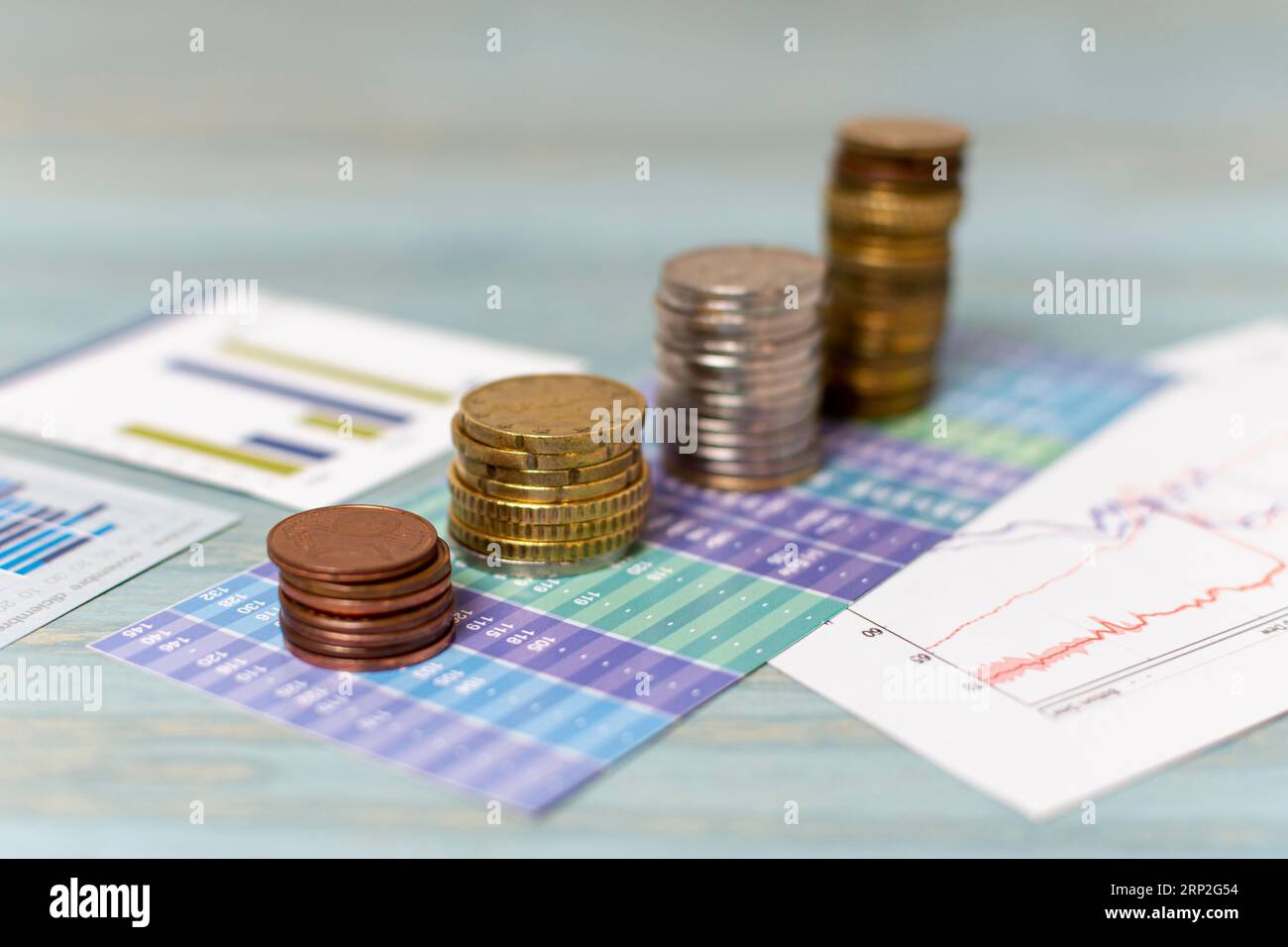 Currency change piles coins Stock Photo - Alamy