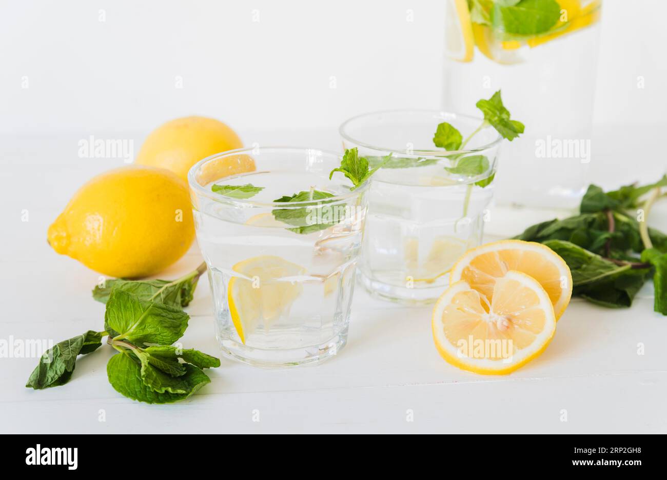 Lemon water glasses ingredients Stock Photo - Alamy