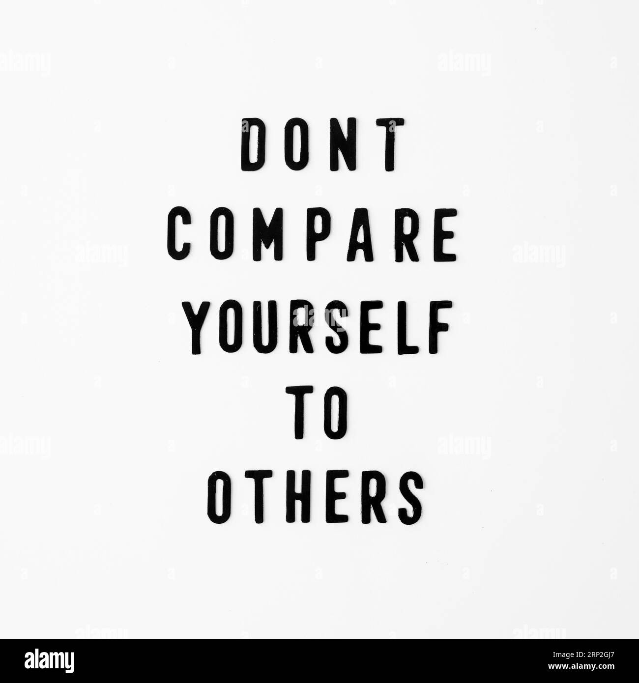 Motivational text white background Stock Photo - Alamy