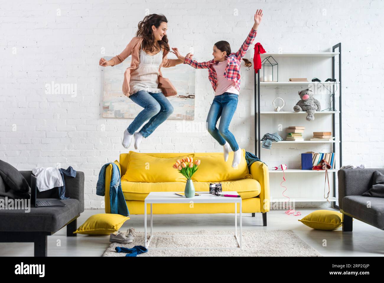 Daughter jumping hi-res stock photography and images - Alamy