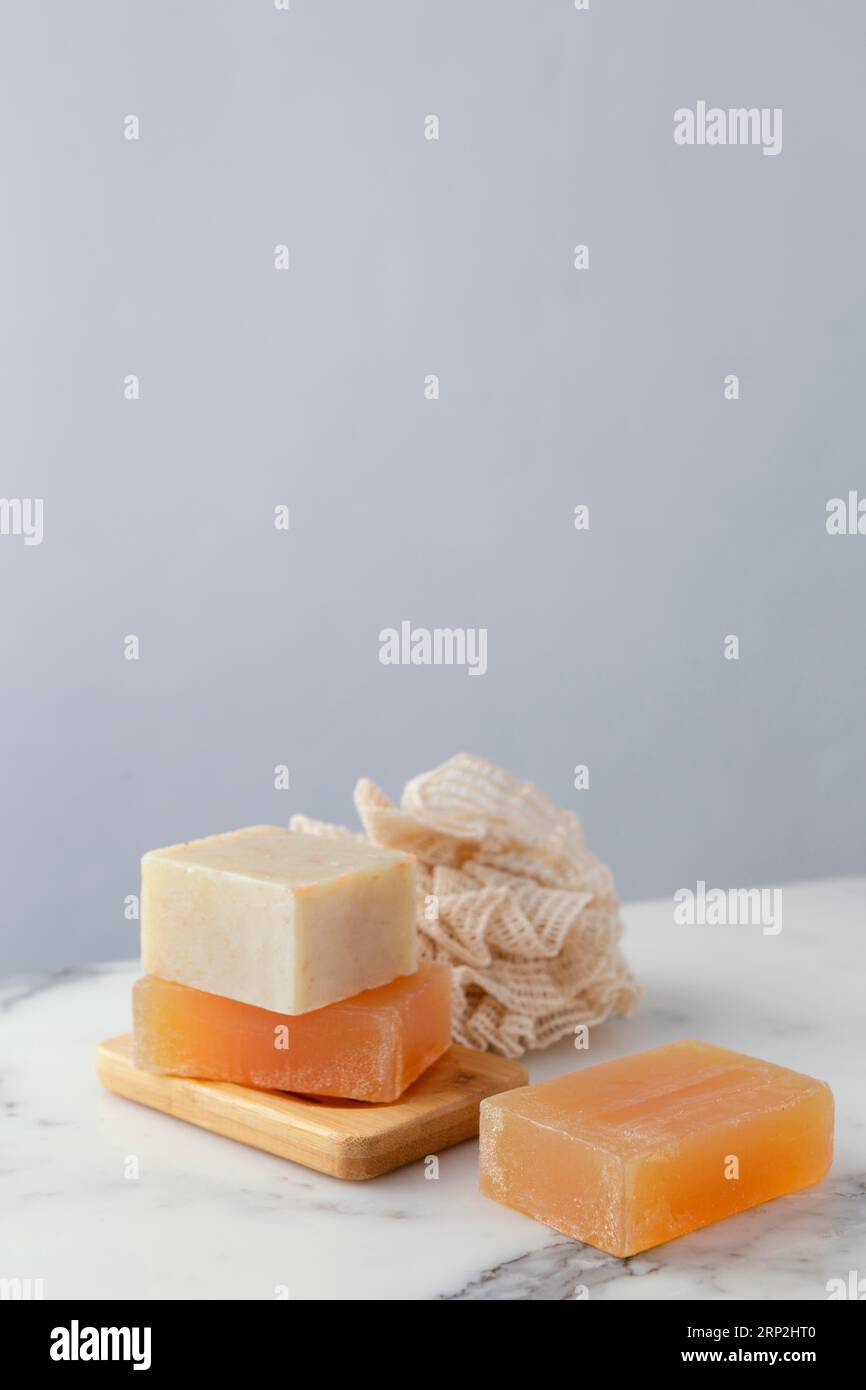 Wooden board with soap Stock Photo - Alamy