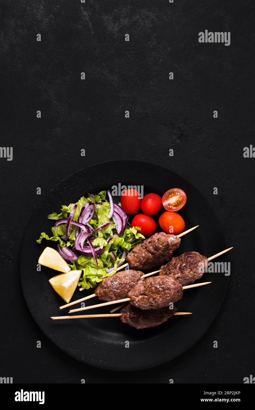 Delicious arabic fast food meat skewers Stock Photo - Alamy