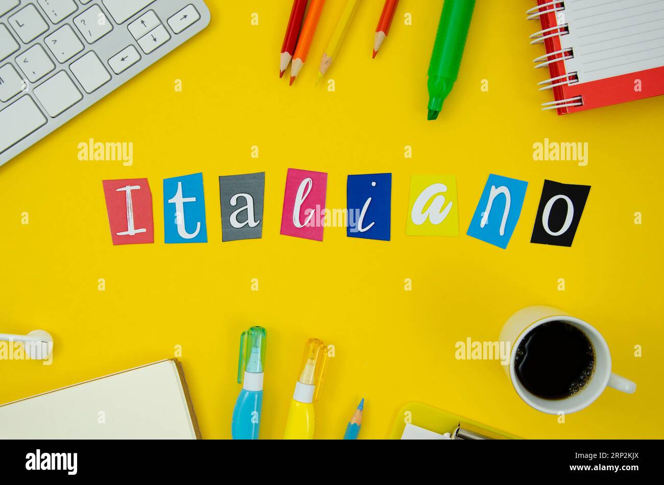 Italian lettering yellow background Stock Photo - Alamy