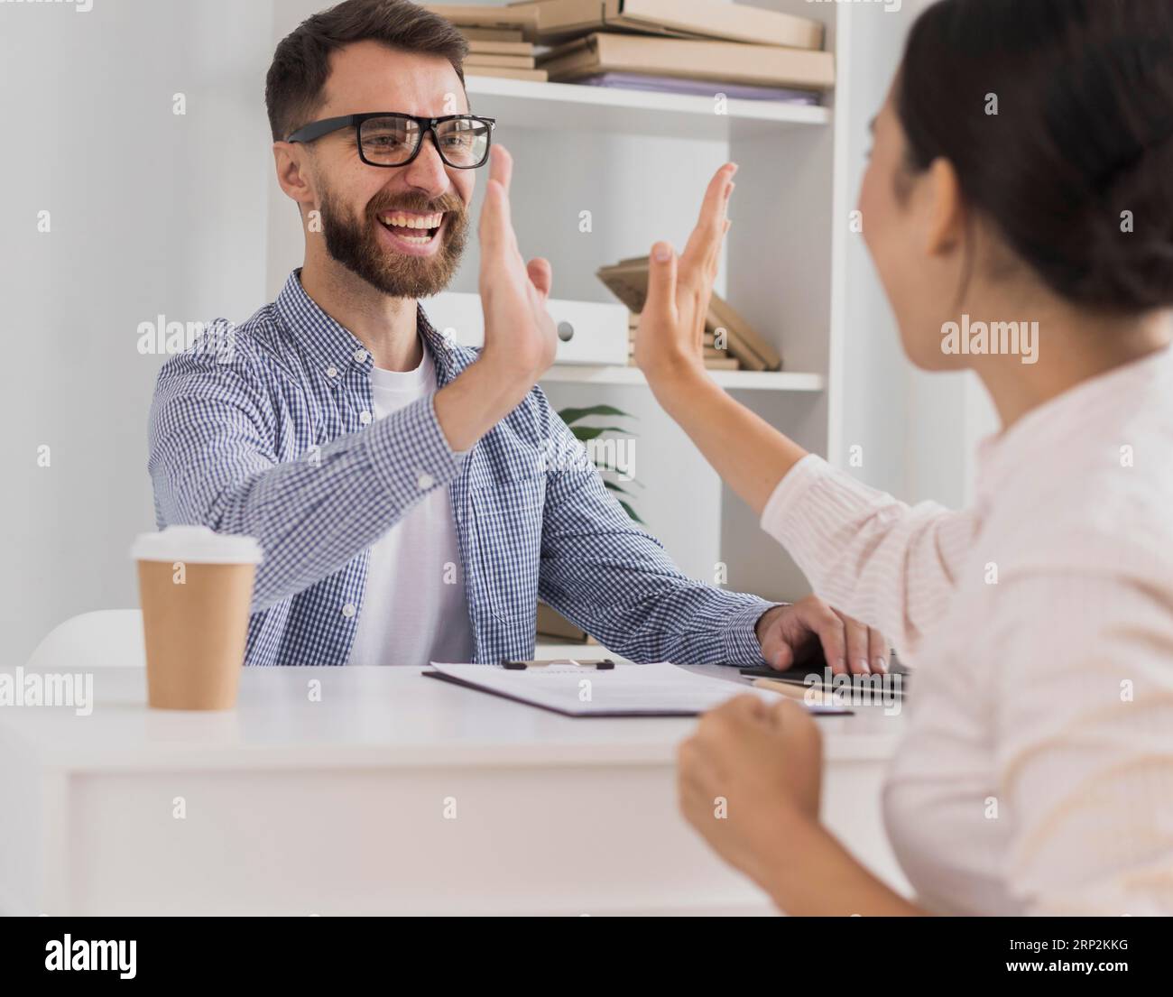 Celebrating career hi-res stock photography and images - Alamy