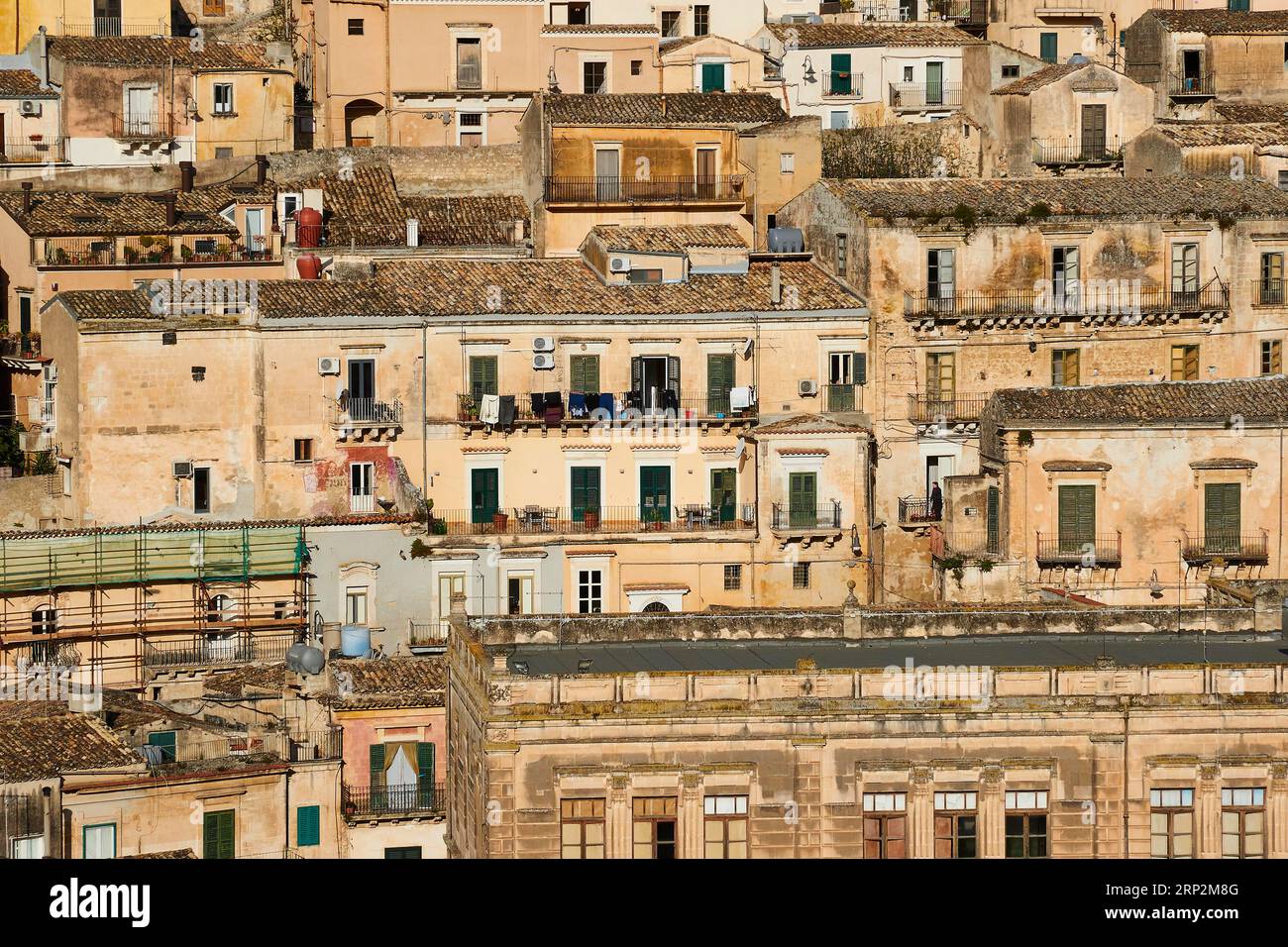 Historical houses on the hillside, old town, detail, Modica, baroque ...