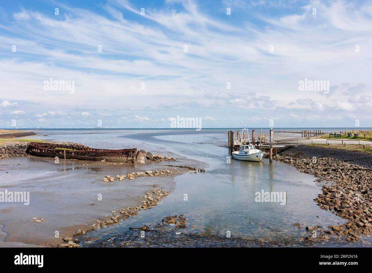 Boat at a jetty on Hallig Langeness, Schleswig-Holstein, Germany Stock ...