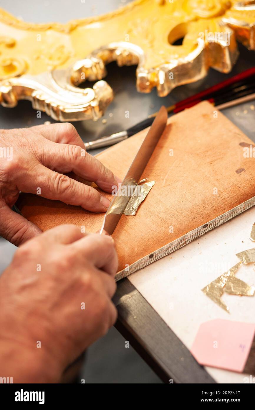 Cutting gold hi-res stock photography and images - Alamy