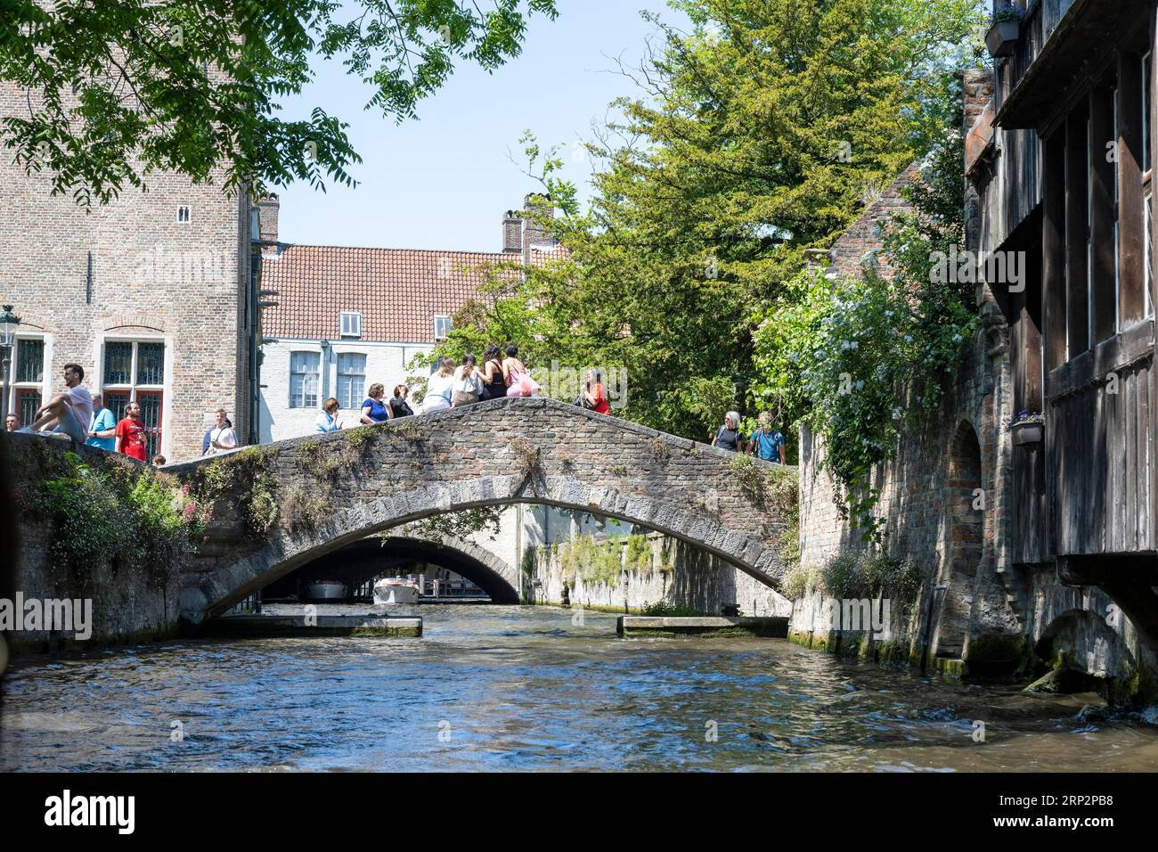 Boniface Bridge and between medieval buildings, Bruges, Flanders ...