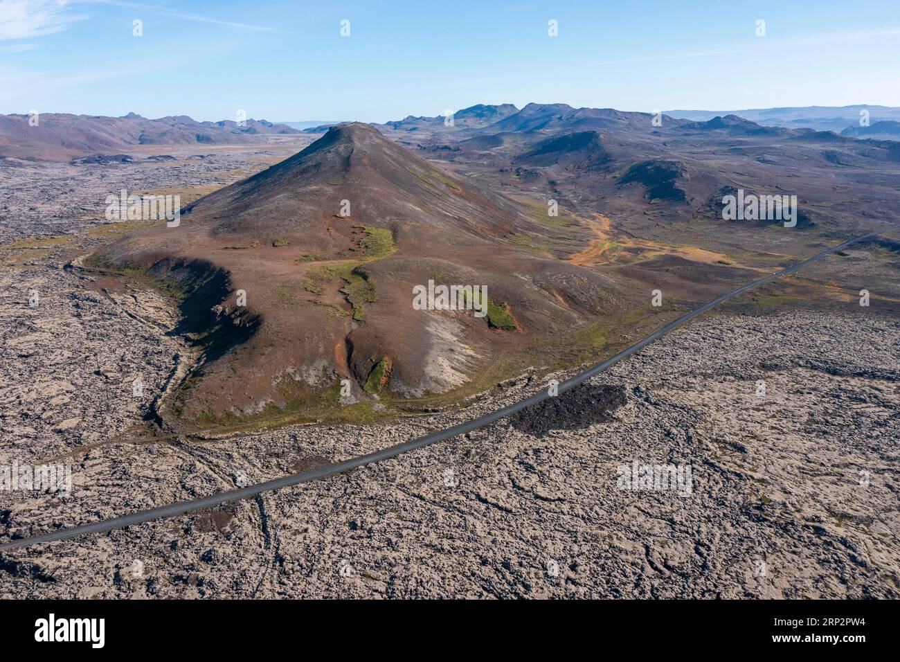 Volcano and moss-covered lava and road, Reykjanes Peninsula, South ...