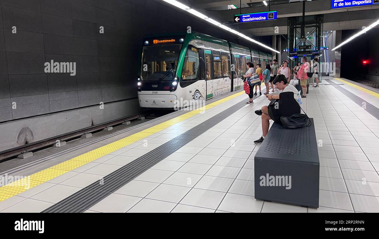 Malaga tram circulation through the station Stock Photo - Alamy