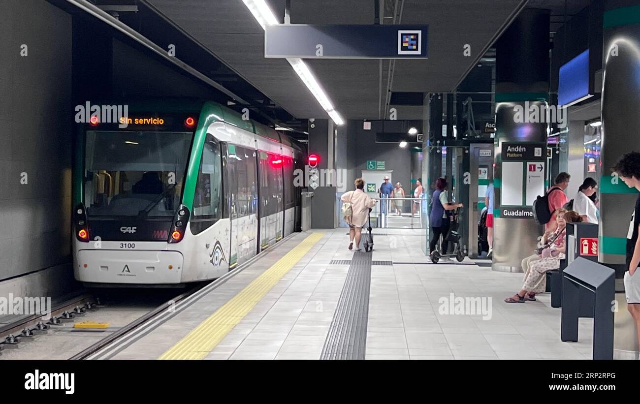 Malaga tram circulation through the station Stock Photo - Alamy