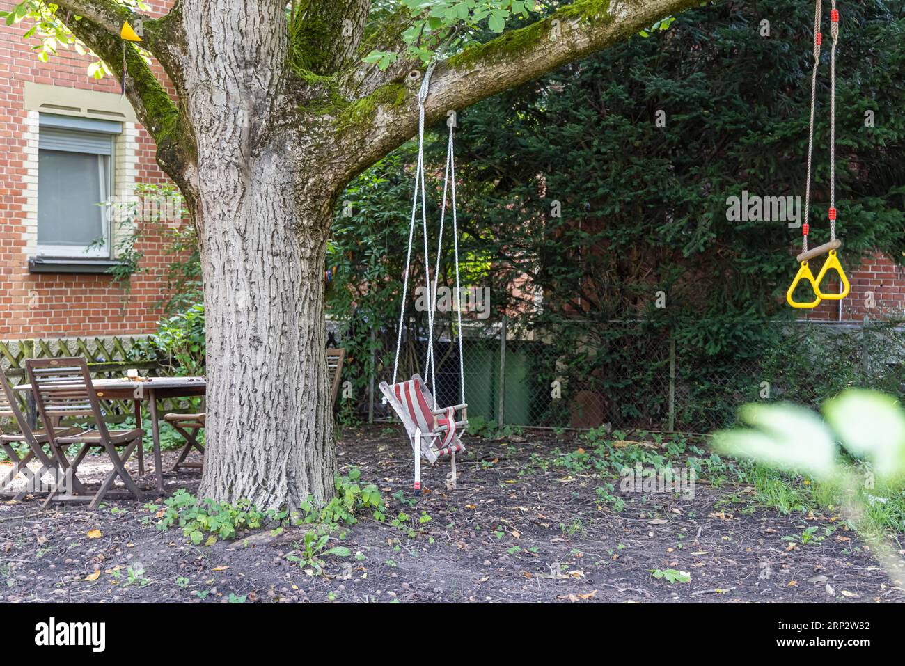Children's swing on a tree, faulty suspension, Stuttgart, Baden ...