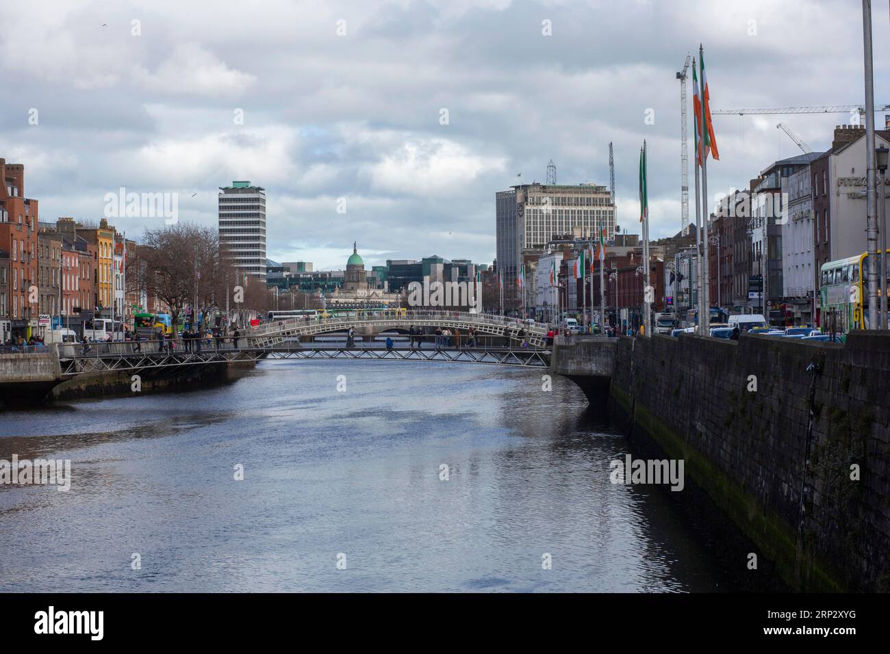 A view of the Ha'penny bridge and Dublin city skyline with Liberty Hall ...