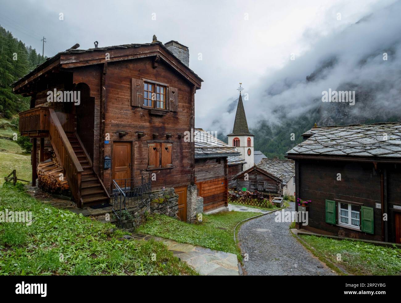 The village of Randa after a snow shower in August, Canton of Valais ...