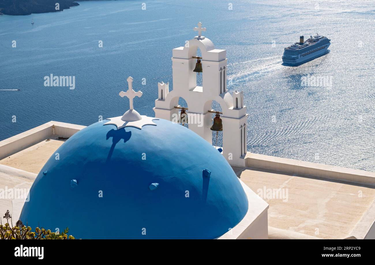 Blue-domed church and belfry, Three Bells of Fira, with Costa Fortuna ...