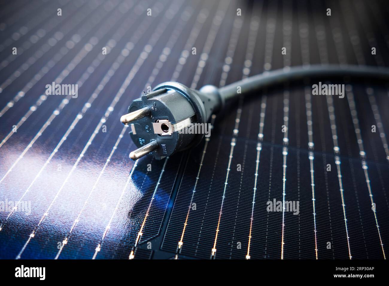 Schuko plug on a solar panel Stock Photo - Alamy