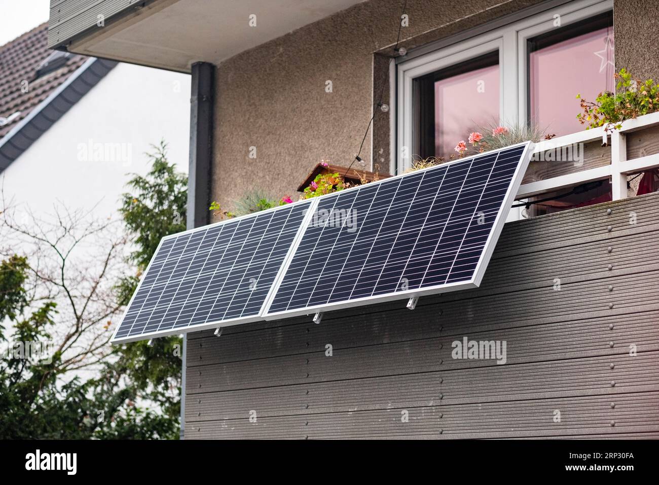 Balcony power plant made of solar panels on a house in Duesseldorf ...