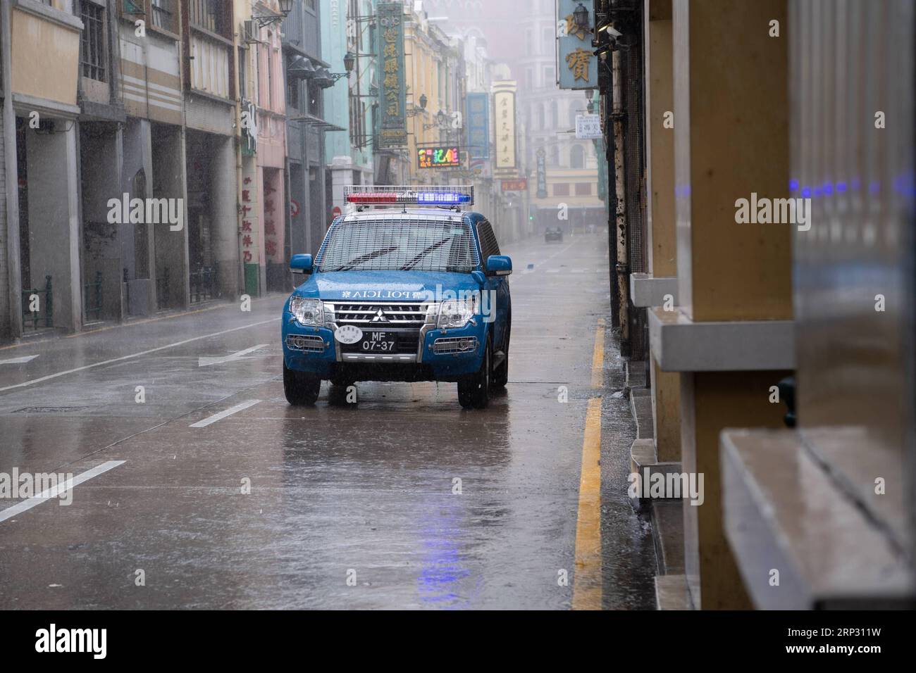 (180916) -- MACAO, Sept. 16, 2018 -- A police car patrols on a road in ...