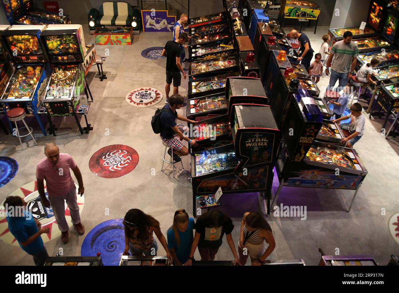 (180916) -- ATHENS, Sept. 16, 2018 -- Visitors of the Athens Pinball ...