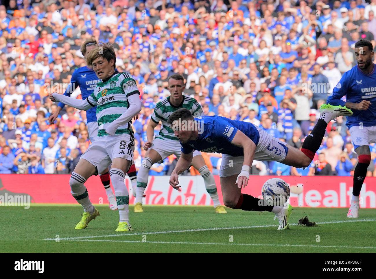 Celtic's Kyogo Furuhashi (left) and Rangers' John Souttar in action ...