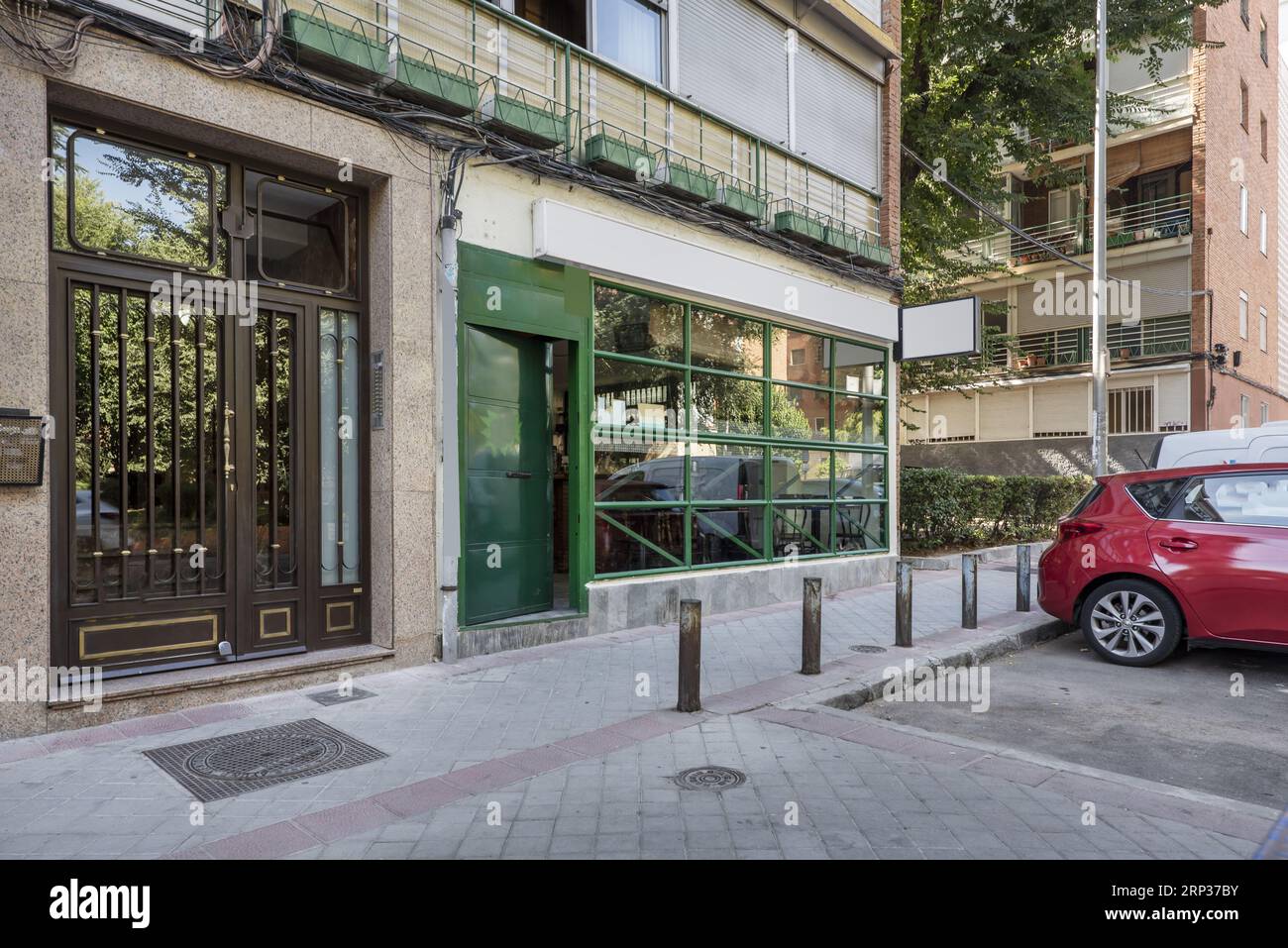 Image of a commercial premises at street level with a glass and iron ...
