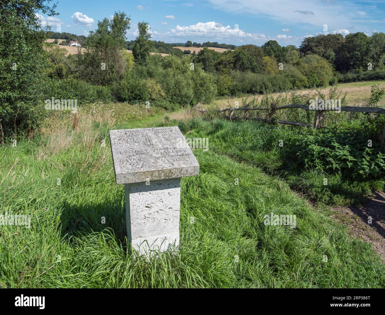 Direction marker stone on the edge of a footpath in Battle (site of the ...