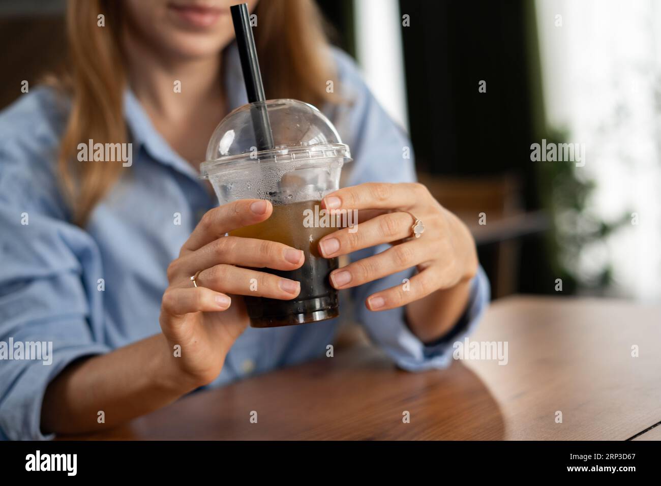 close-up of caucasian young woman drink bubble tea at the restaurant Stock Photo - Alamy