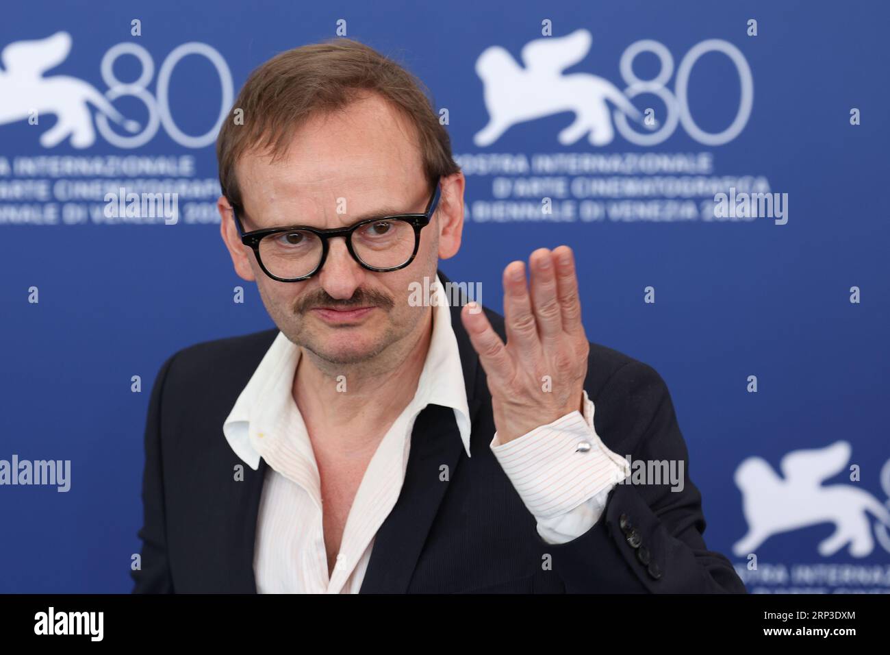 Milan Peschel attends a photocall for the "The Palace" at the 80th ...