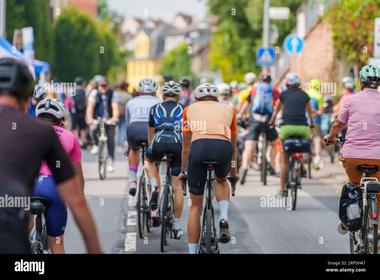 Gelnhausen, Germany. 03rd Sep, 2023. Cyclists crowd the closed road in ...