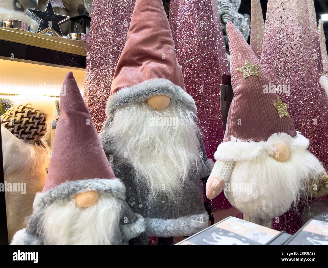 three little christmas gnomes gonks in pink hats mobile photo Stock ...