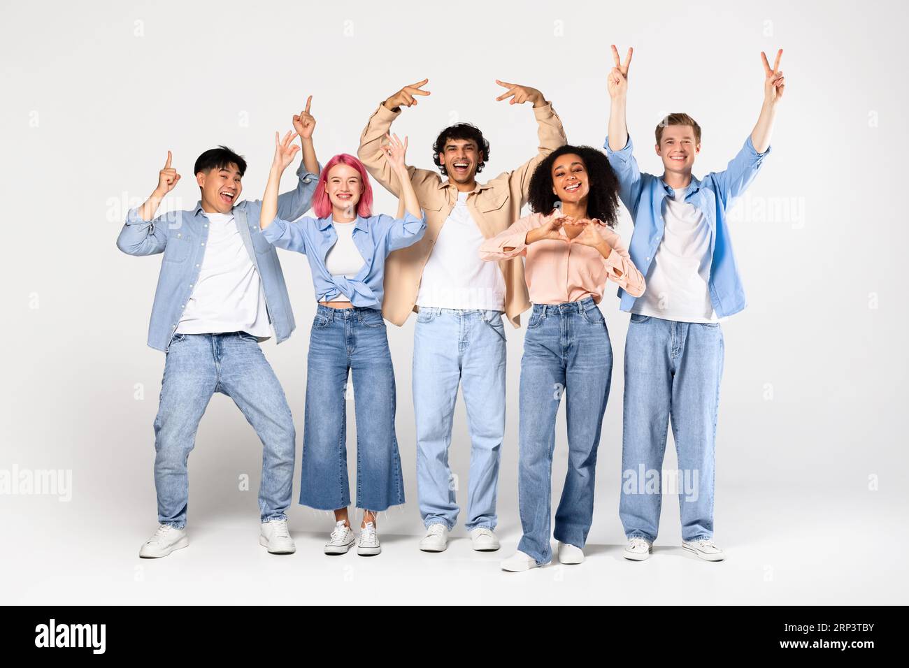 Happy diverse friends showing various non verbal body language hand ...