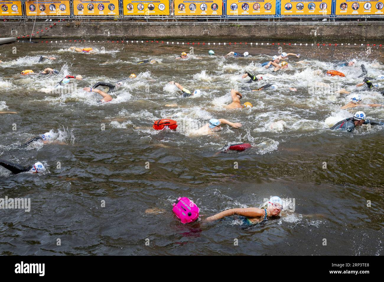 AMSTERDAM - Participants of the Amsterdam City Swim swim in the ...
